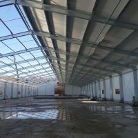 China Q235 Prefabricated Steel Structure Warehouse Building M20 Anchor Bolt Rockwool Wall Panel 75mm for sale