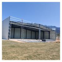 China High Strength Steel Truss Garage Hangar Building 50mm PU Sandwich Panel for sale