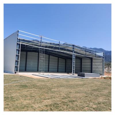 China High Strength Steel Truss Garage Hangar Building 50mm PU Sandwich Panel for sale