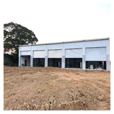 China Economical Q235 Q355 Steel Frame Prefabricated Warehouse 80m Span for sale