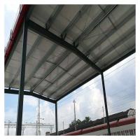 China Customizable Steel Frame Car Shed Garage Hangar 50mm Sandwich Panel H Beam Structure for sale