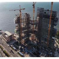 China Light Steel Structure Building 30m Span Hurricane Resistant Pre Engineered Steel Building for sale