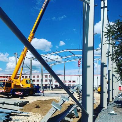 China Steel Frame Storage Building Q235 Q345 Fire Resistant 250-450sqm Prefabricated Workshop for sale