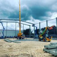 China Steel Frame Storage Building Q235 Q345 Fire Resistant 250-450sqm Prefabricated Workshop for sale