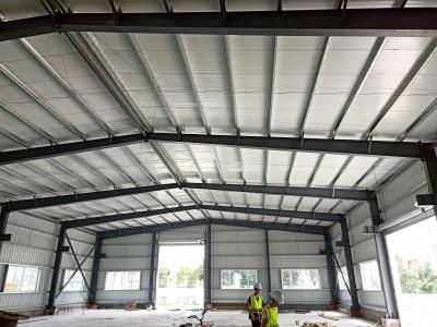 China Steel Structure Galvanized Warehouse With Electric Shutter Door for sale