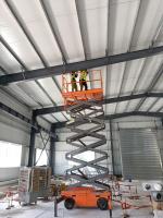 China Steel Structure Galvanized Warehouse With Electric Shutter Door for sale