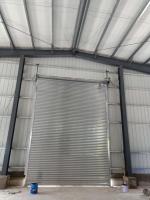China Steel Structure Galvanized Warehouse With Electric Shutter Door for sale