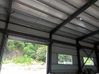 China Steel Structure Galvanized Warehouse With Electric Shutter Door for sale