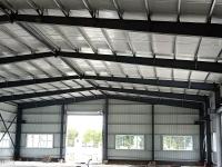 China Fireproof Steel Structure Building Warehouse with Electric Rolling Shutter Door 0.476mm Panel for sale