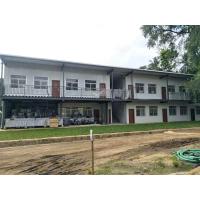 China Steel Structure Warehouse with Roll-up and Sliding Door 50 Year Lifespan for sale