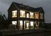 China Luxury Two Story Steel Frame Prefab Home 100x3.0mm Column 75mm Sandwich Panel for sale