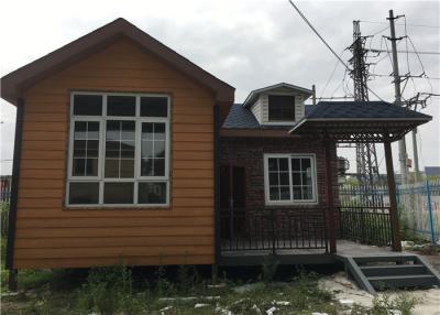 China 56sqm Lightweight Cement Board Wall Prefab Steel House with Asphalt Shingle Roof for sale