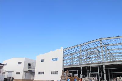 China Prefabricated Steel Frame Warehouse Building 50mm Sandwich Panel Q235B Steel Structure for Agricultural Industrial Use for sale