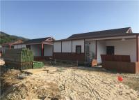 China Pre Engineered Cement Cladding Q345 Prefab Steel House 100mm Fiber Cement Board for sale