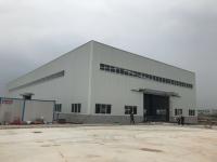 China Prefabricated Steel Workshop Building 50 Year Durability Q345B Steel Frame Custom Sizes for sale