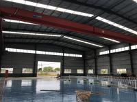 China Prefabricated Steel Workshop Building 50 Year Durability Q345B Steel Frame Custom Sizes for sale