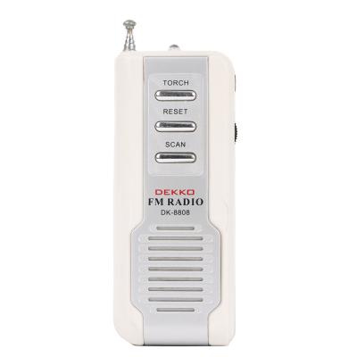 China DEKKO DK-8808 White ABS Pocket Radio FM Auto Scan Built-In Speaker Dry Battery Powered Mini Flashlight for sale