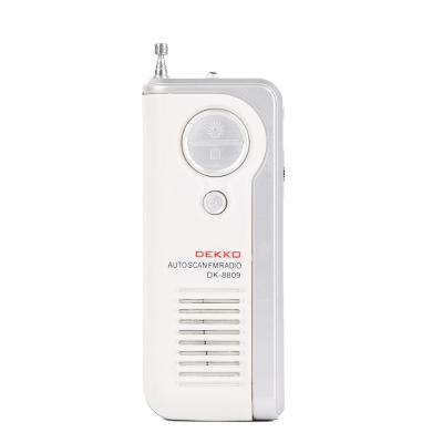 China DEKKO DK-8809 Mini Flashlight FM Radio 88-108 MHz Auto Scan Portable Dry Battery for sale