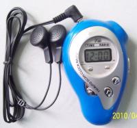 China Mango Shape Time LCD Display Radio 25mm AAA Batteries Power FM Clock for sale