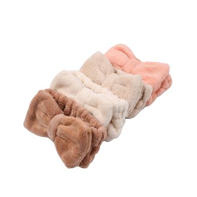 China For women simple design elastic cute bowknot towel spa headband bath beach custom logo makeup headband for sale