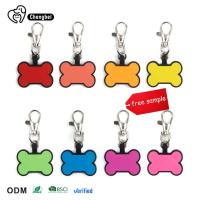 China Custom Silicone Pet ID Tags 71mm x 39mm Bone-Shaped Design with Food-Grade Material and Multi-Color Options for sale