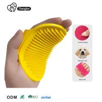 China Portable TPR Dog Bath Brush 13x10cm Ergonomic Pet Grooming Comb with Massage Bristles for sale