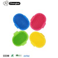 China Portable TPR Dog Bath Brush 13x10cm Ergonomic Pet Grooming Comb with Massage Bristles for sale