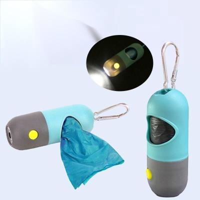 China LED Dog Poop Bag Dispenser with Flashlight - 11×4.5cm Plastic Waste Bag Holder with Carabiner Clip for sale