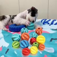 China Natural Rubber Interactive Dog Ball 6cm 7cm Unbreakable Treat Dispensing Pet Chew Toy for sale