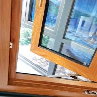 China Double Swing Interior Casement Window Door Wood Look UPVC for sale