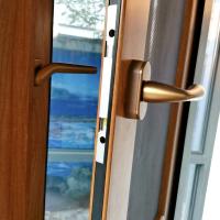 China Double Swing Interior Casement Window Door Wood Look UPVC for sale