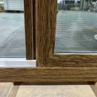 China UPVC Sliding Windows Woodgrain / White Two-Tone Customizable Colors & Sizes Built-in Screen OEM Manufacturer for sale