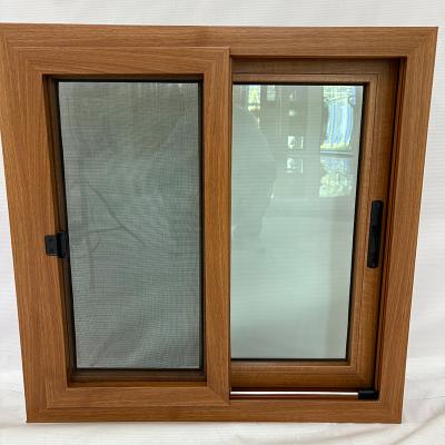 China UPVC Wood Foil Double Sliding Windows Custom European Style Energy Efficient for sale