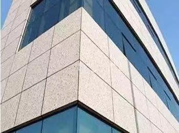 China Modern Stone Curtain Wall with Excellent Thermal Insulation and Low Maintenance for sale
