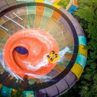 China Flying Bowl Shaped Water Slide With Splash Pad Kids Play Equipment and Fiberglass Water House for Sale for sale