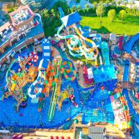 China Commercial Water Park Equipment Ocean Style Medium Fiberglass Outdoor Water Playground Slide Spray Games for sale