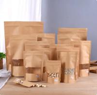 China Eco Friendly Kraft Paper Stand Up Pouches Food Grade Resealable Clear Window Storage Bags for Snacks Coffee Home Kitchen for sale