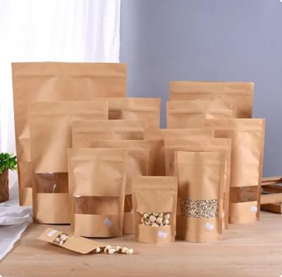 China Eco Friendly Kraft Paper Stand Up Pouches Food Grade Resealable Clear Window Storage Bags for Snacks Coffee Home Kitchen for sale