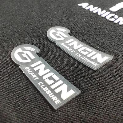 China TPU Rubber Silicone Heat Transfer Logo Embossed Garment Label Iron On 3D Football Logo for sale
