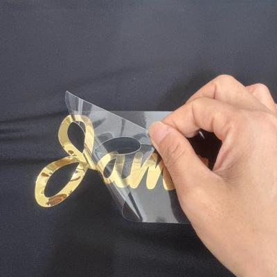 China Custom Metallic Soft Heat Transfer Logo - Low MOQ Foil Iron-On Label for Hats Apparel Sportswear for sale