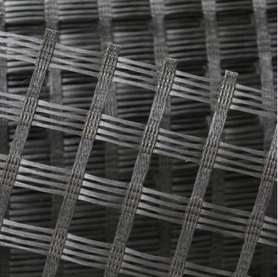 China 100-100KN/M Bitumen Coated Fiberglass Geogrid Asphalt Pavement Reinforcement Geogrid for sale