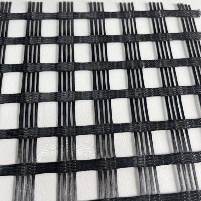China 400KN Woven Coated PET Polyester Geogrid High Strength for Reinforcement In Railway for sale