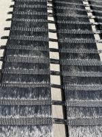 China 900-50KN High Strength Polyester Uniaxial Geogrid For Stabilication Reinforcement for sale