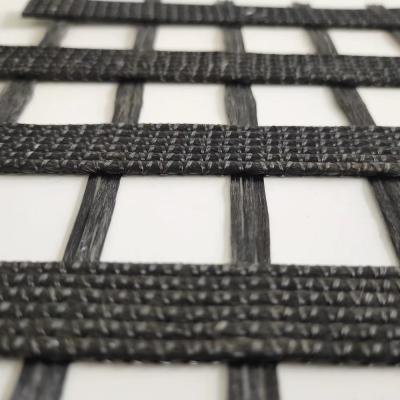 China 250 KN/m Reinforce Polyester Uniaxial Geogrid Dam And Slope River Bank Embankment Stabilization for sale