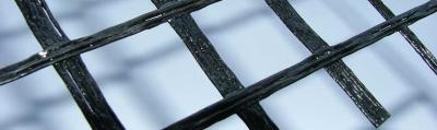 China Asphalt Coating Self Adhesive Fiberglass Geogrid 50KN For Road Paving Road Reinforcement for sale