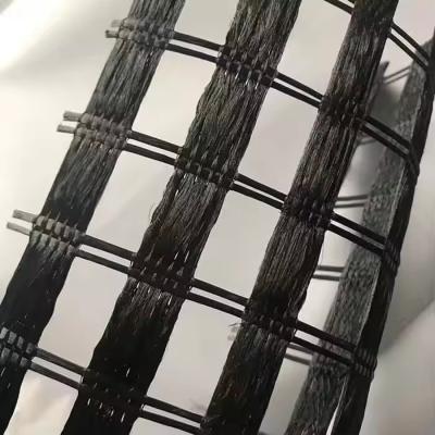 China SBR Coated 100-300KN/M Uniaxial Polyester Geogrids Stabilize Embankments Slope Retaining Wall for sale