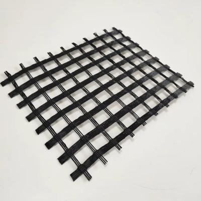 China Asphalt Reinforcement 100KN Fiberglass Geogrid Mesh 25.4x25.4mm For Bitumen Road Surfaces for sale