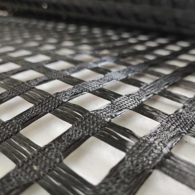 China Highly Efficient 150-150KN Polyester Geogrid Mesh For Embankment Retaining Walls Slopes for sale