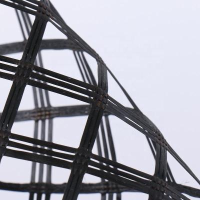 China Warp-Knitting Biaxial Uniaxial Polyester Reinforced Geogrid For Reinforcing Pavement Concrete Road for sale