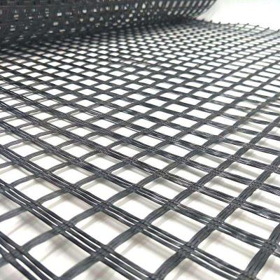 China Pet Uniaxial 200-30 Kn/m  Polyester Geogrid PVC Coating Slope Reinforcement Solutions  Road Construction for sale